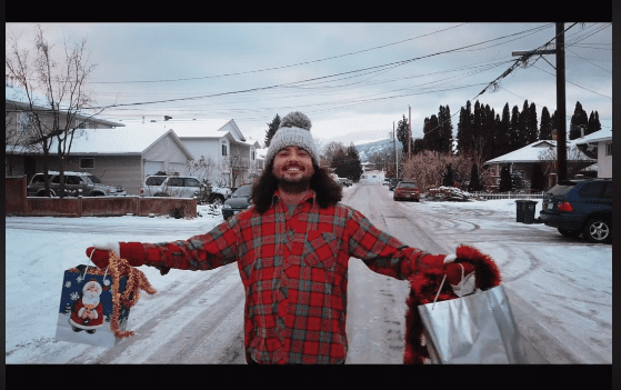 Man skating down a frozen Kelowna road with presents goes viral (VIDEO)