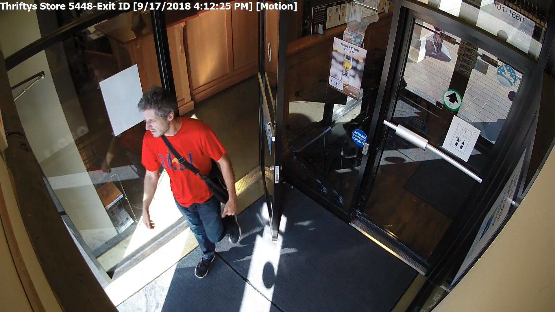 Man caught on camera stealing liquor bottles from a store in Saanich ...