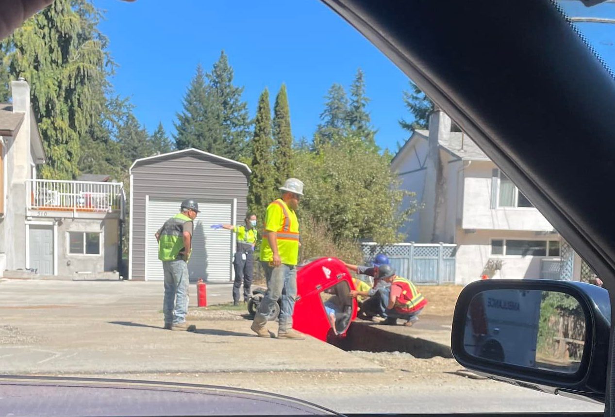 Woman nearly drives scooter into 10-foot construction hole in Colwood